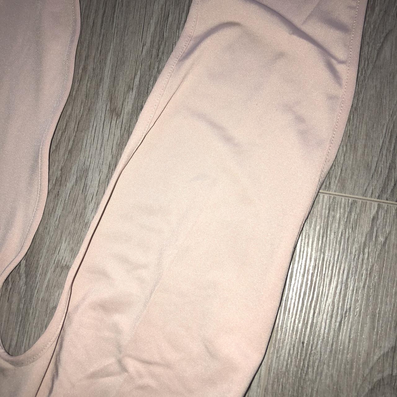 Nude high leg thong swimsuit, never worn as too big... - Depop