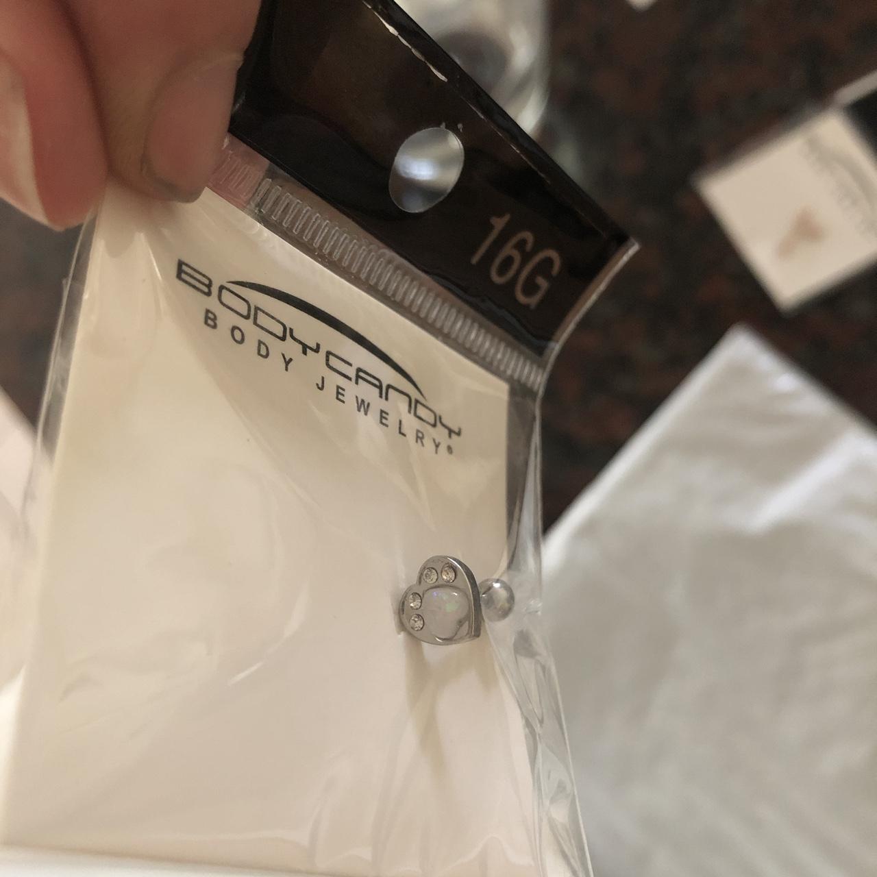 -Cartilage piercing jewellery -Opal paw print love... - Depop