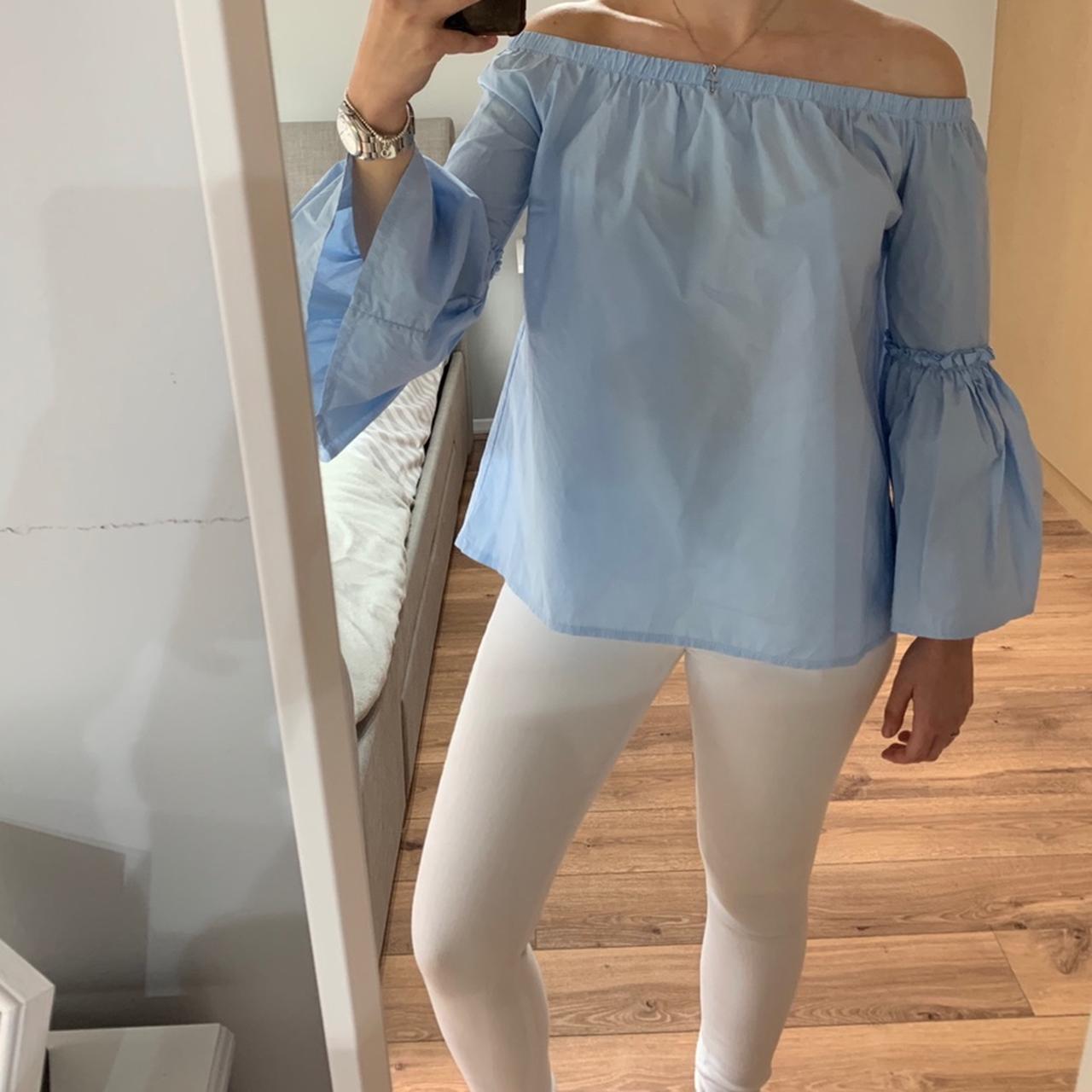 Blue off the shoulder shirt with open back and... - Depop