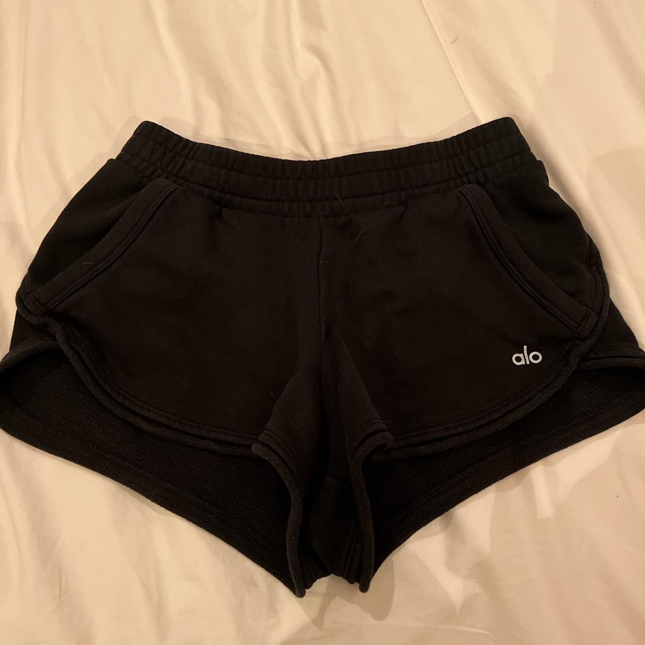 These are super comfy Alo black shorts in a size... - Depop