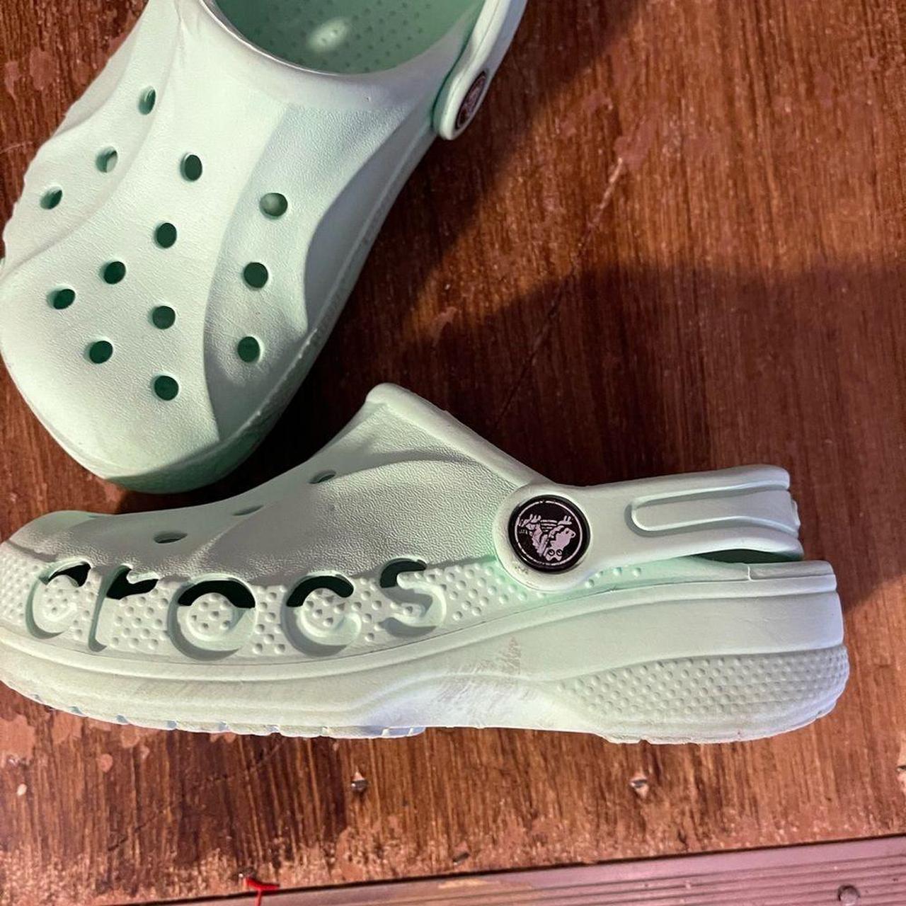 Kids crocs in great condition a mint green color... - Depop