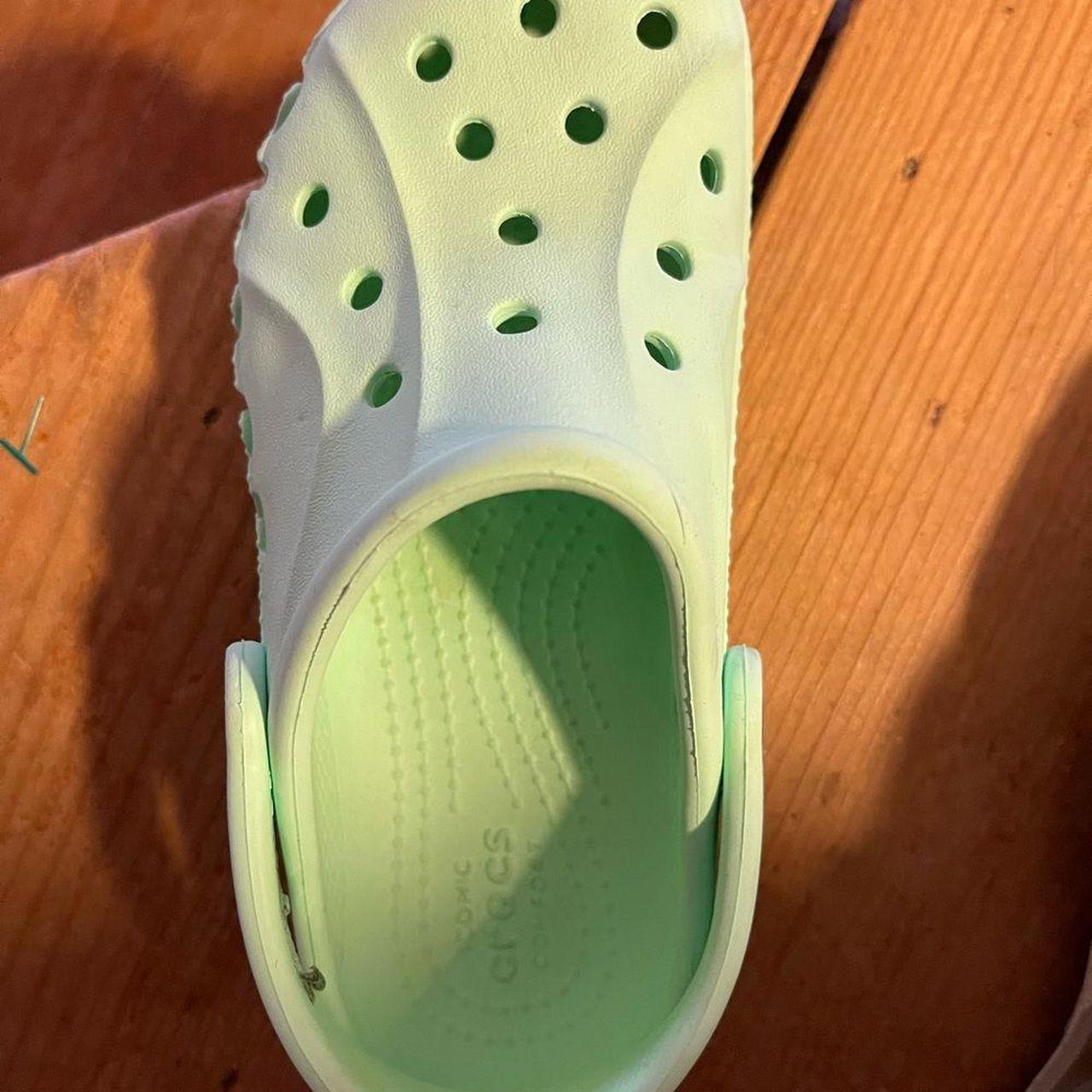 Kids crocs in great condition a mint green color... - Depop