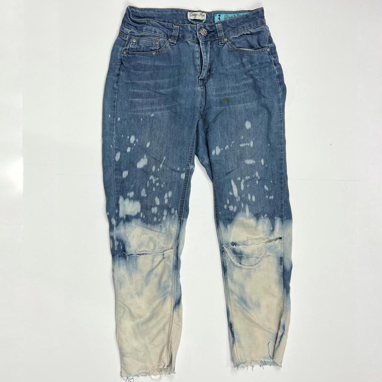Bleached distressed jeans - Depop