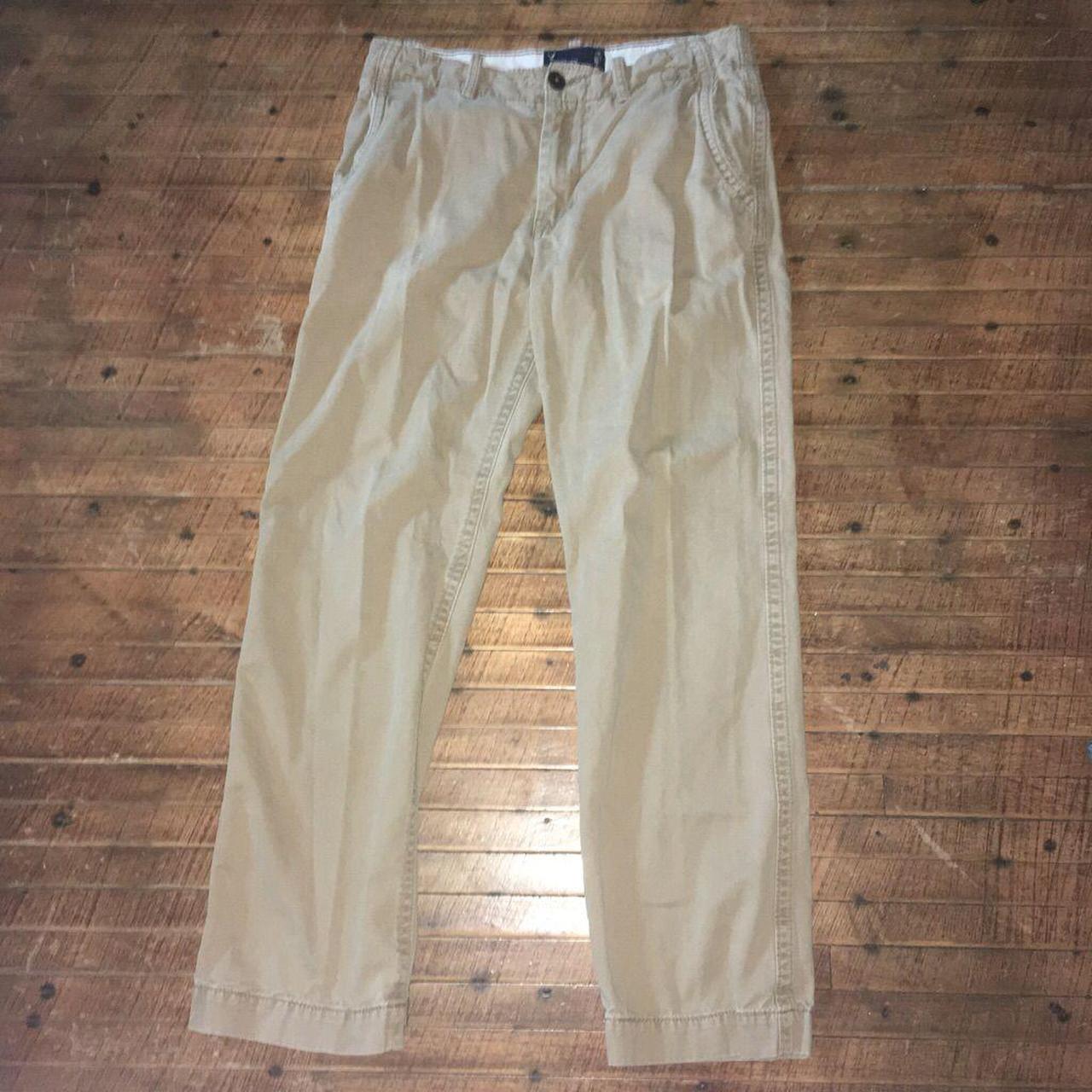 Tan, khaki, flat front slacks. Great, versatile pair... - Depop