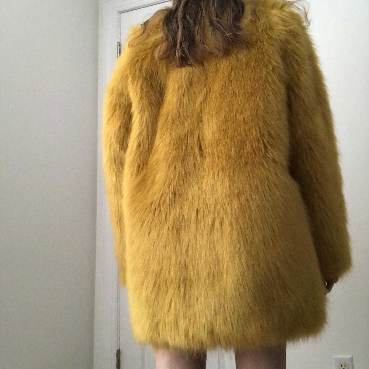 NWT yellow faux fur coat from urban outfitters!... - Depop