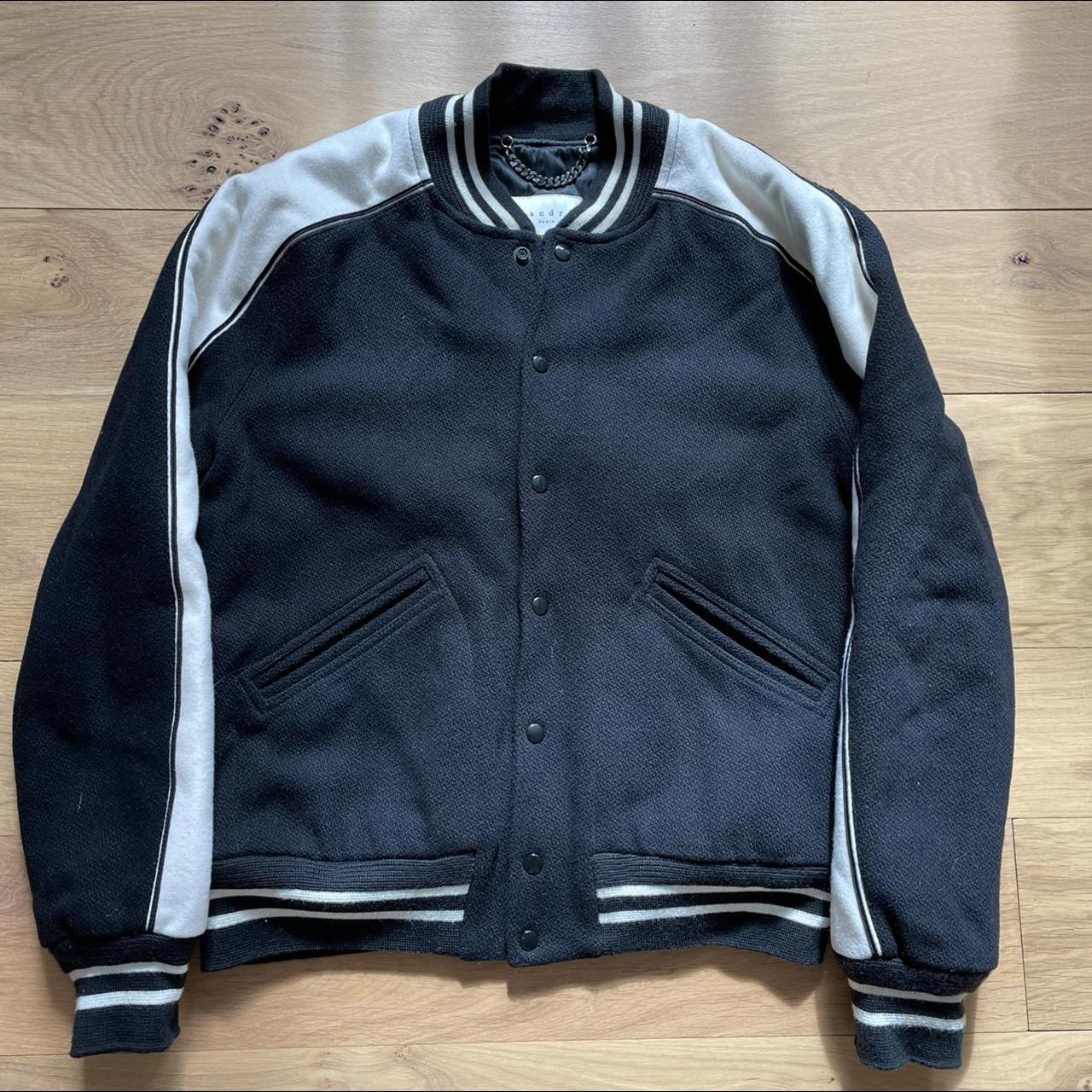 Sandro mens Varsity jacket in black and cream. Worn... - Depop
