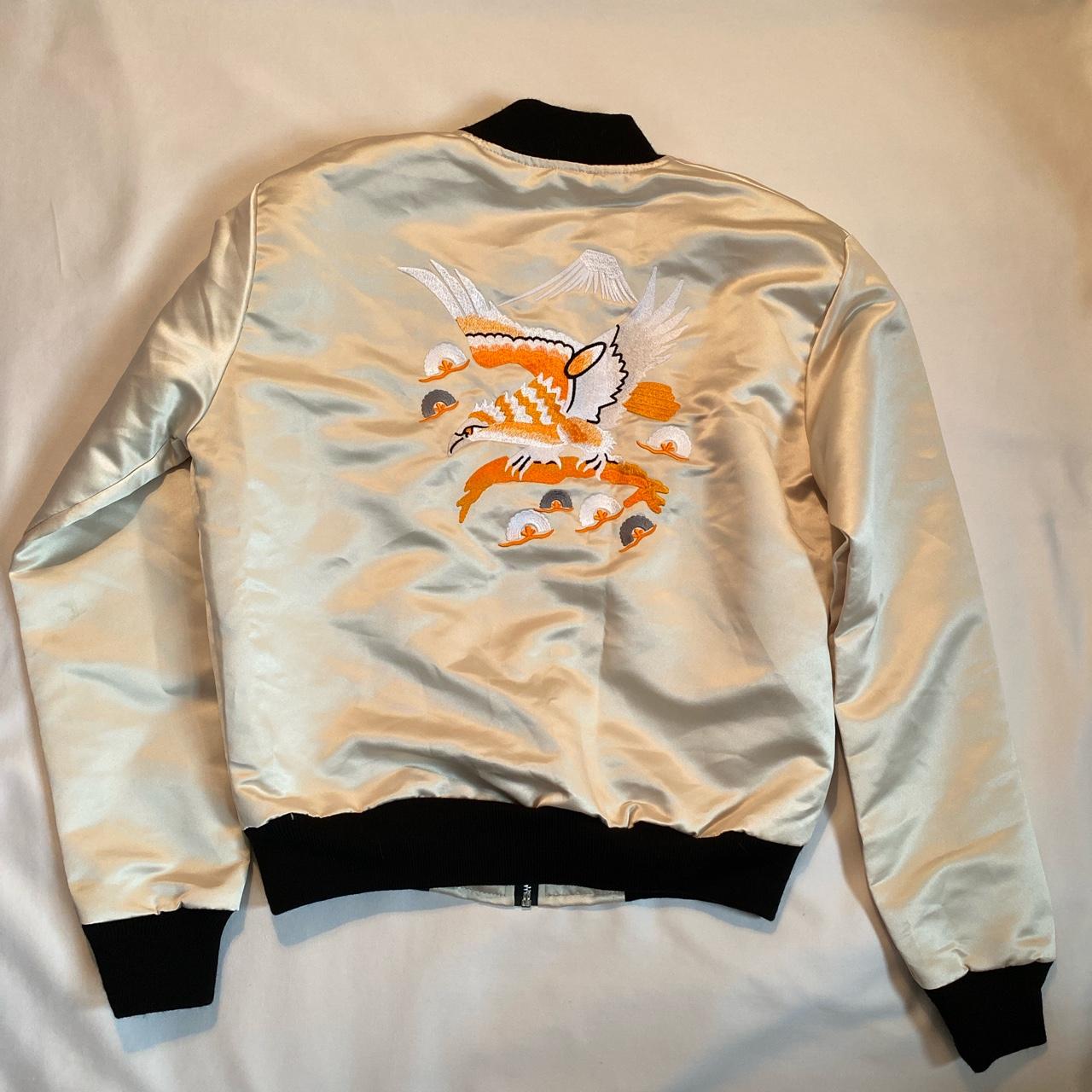 Champagne colored bomber with detailing on the back.... - Depop