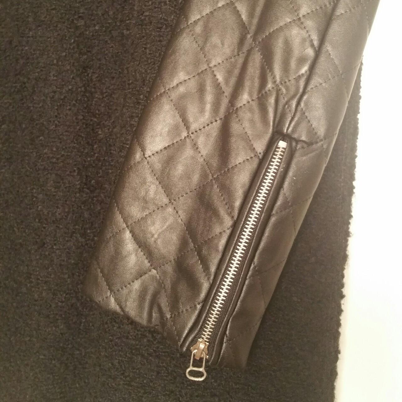 Worn black Romwe coat. Faux quilted leather sleeves.... - Depop