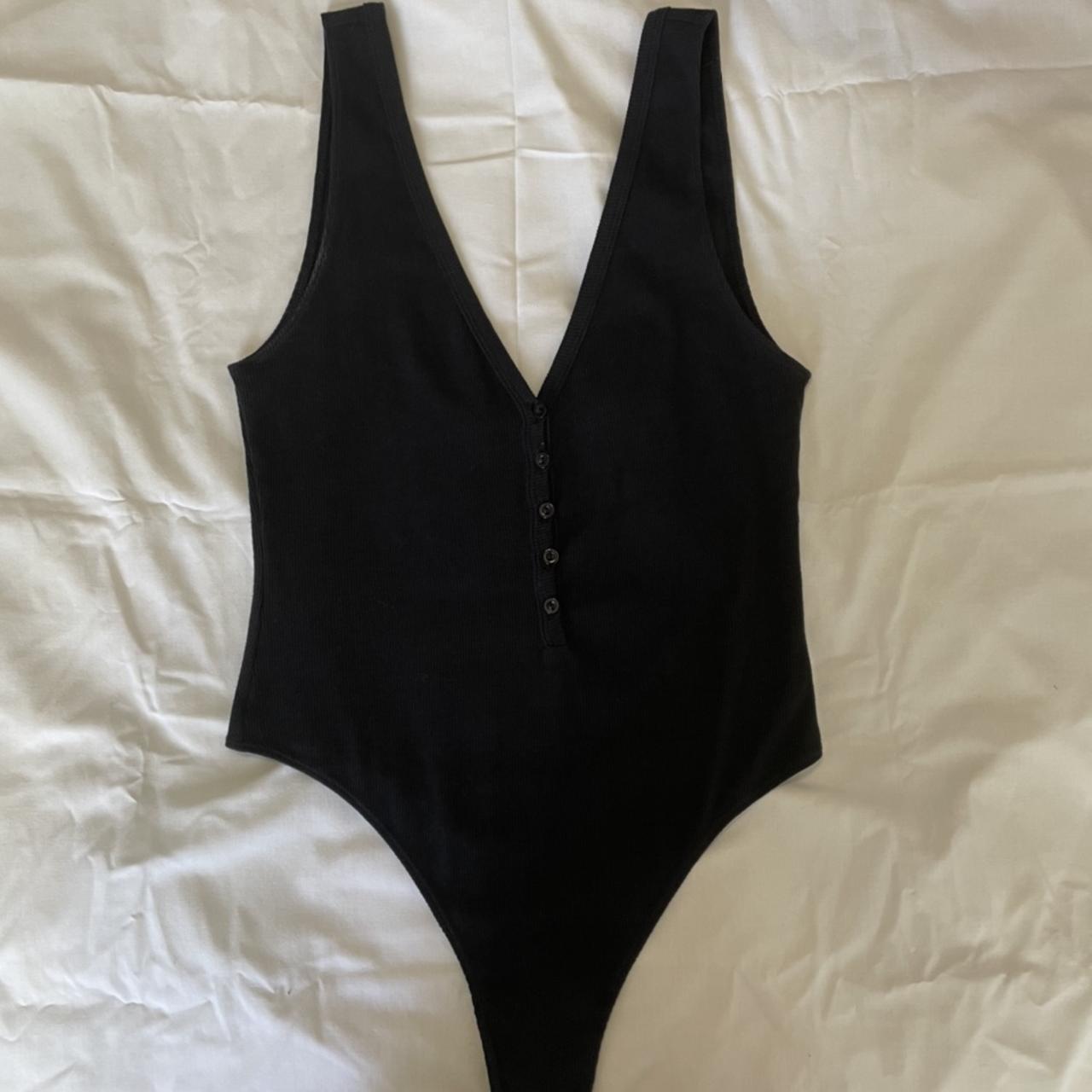 American Apparel ribbed body suit. Has a v cut front... | Depop