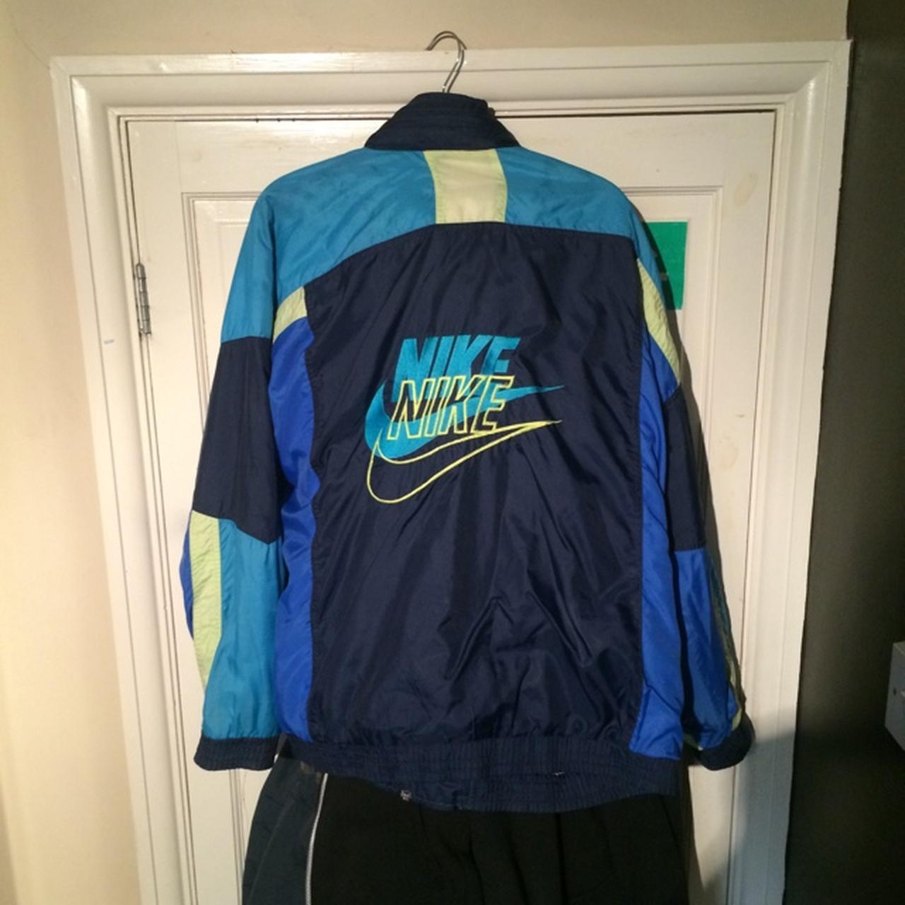 retro vintage nike jacket, has a roll out hood... - Depop