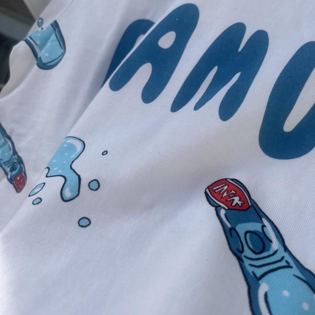 Dolls Kill Women's Blue and White T-shirt | Depop