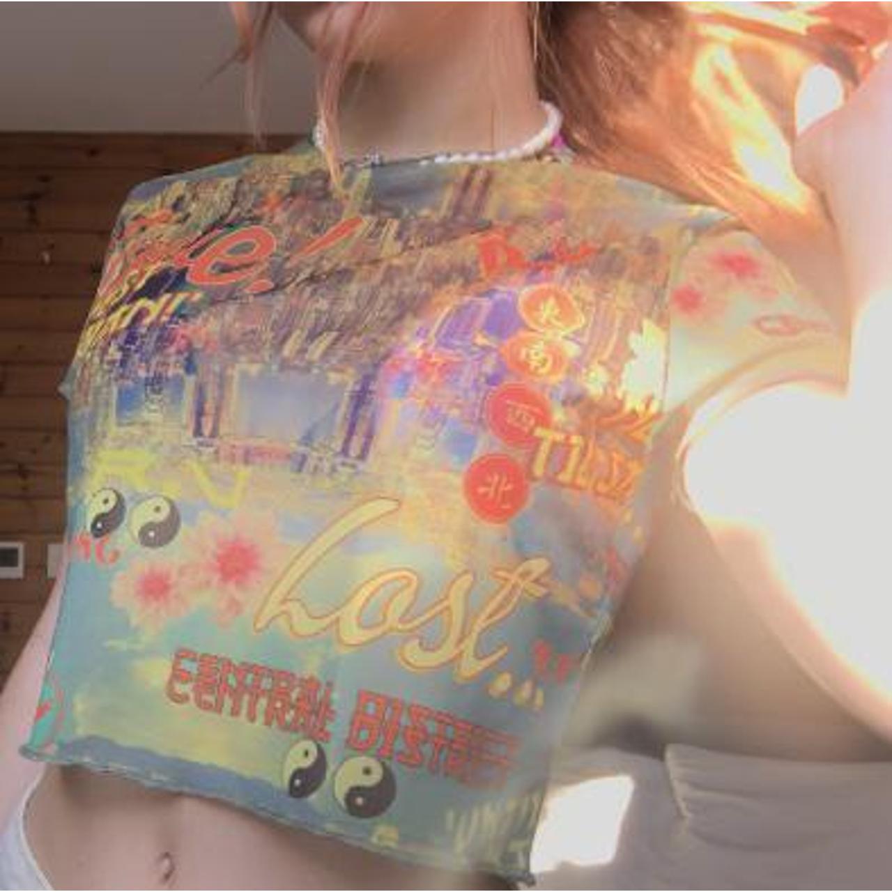 mesh graphic tee. i cut the label out the back so... - Depop