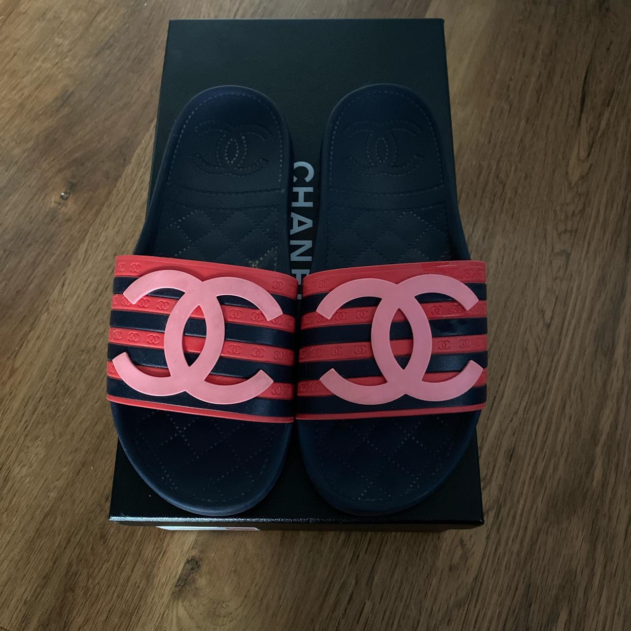 Excellent condition Chanel sliders pink & navy worn... - Depop