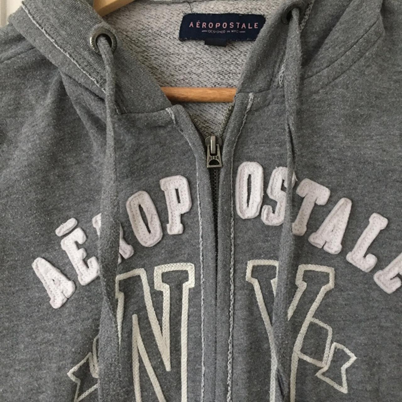 vintage Aeropostale grey zip up sweater with a... - Depop