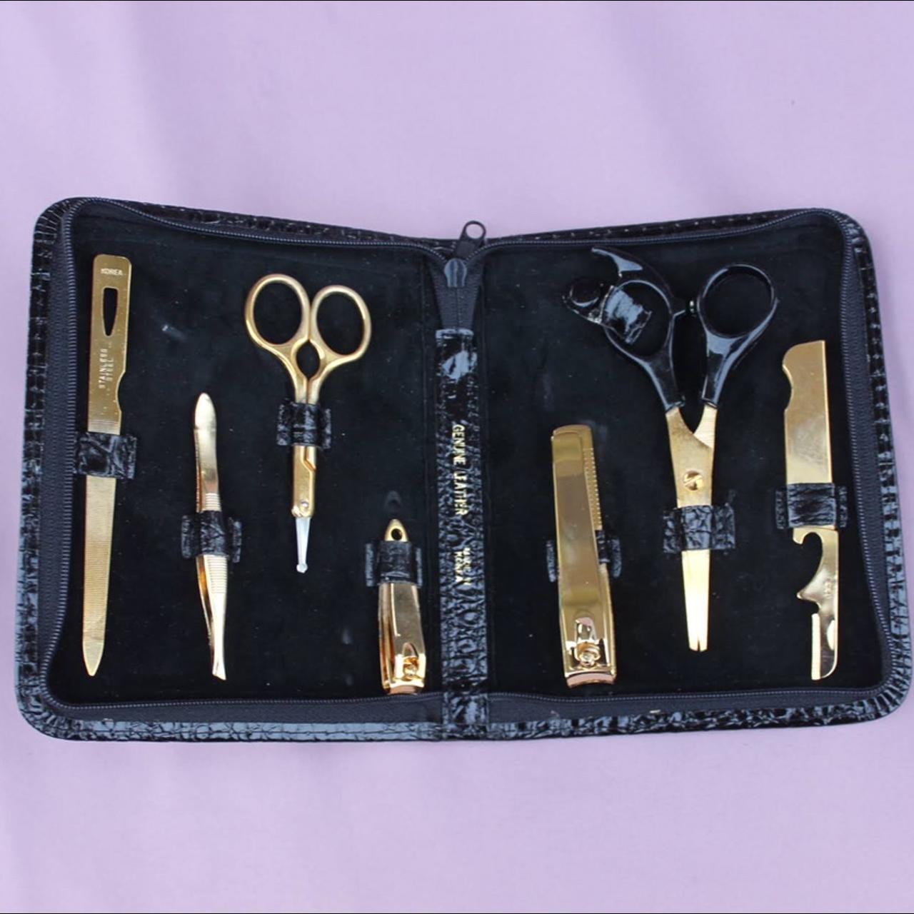 Gold plated stainless steel personal care set in a... - Depop