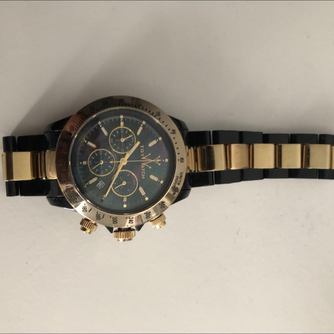 Toy Watch Black Gold Great condition for age Needs... - Depop