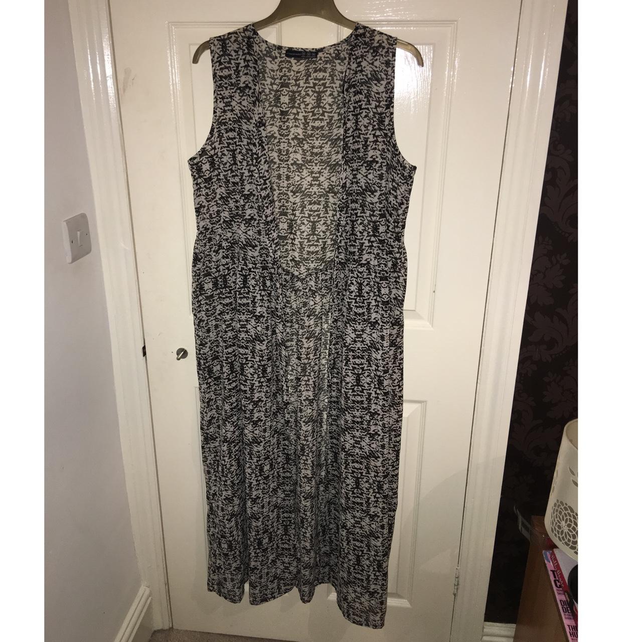 Very pretty long floaty mesh sleeveless jacket, tag... - Depop