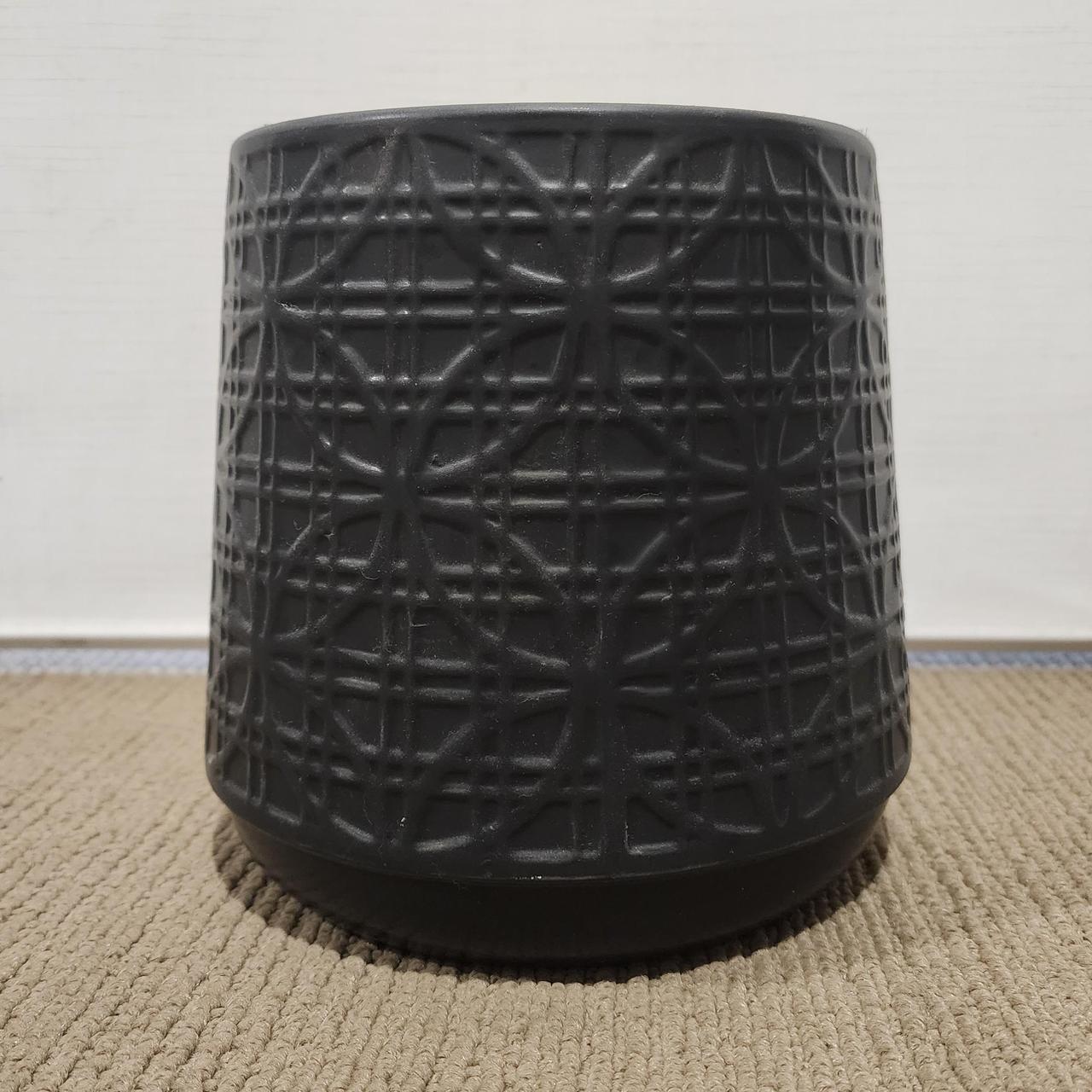 Black textured ceramic plant pot w cute design on... - Depop