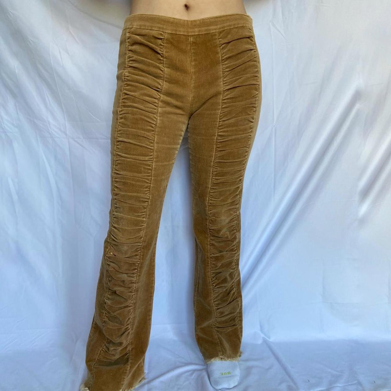 Low rise brown flare pants. Unsure of the size but I... - Depop