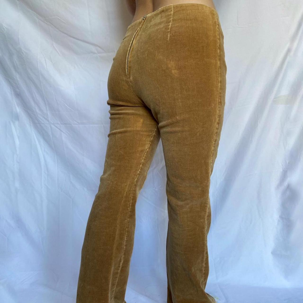 Low rise brown flare pants. Unsure of the size but I... - Depop