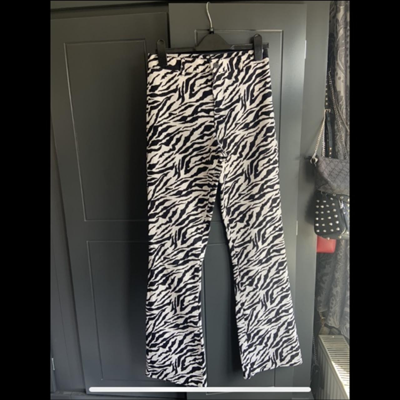 MOTEL ROCKS: zebra flares Size small Brand new... - Depop