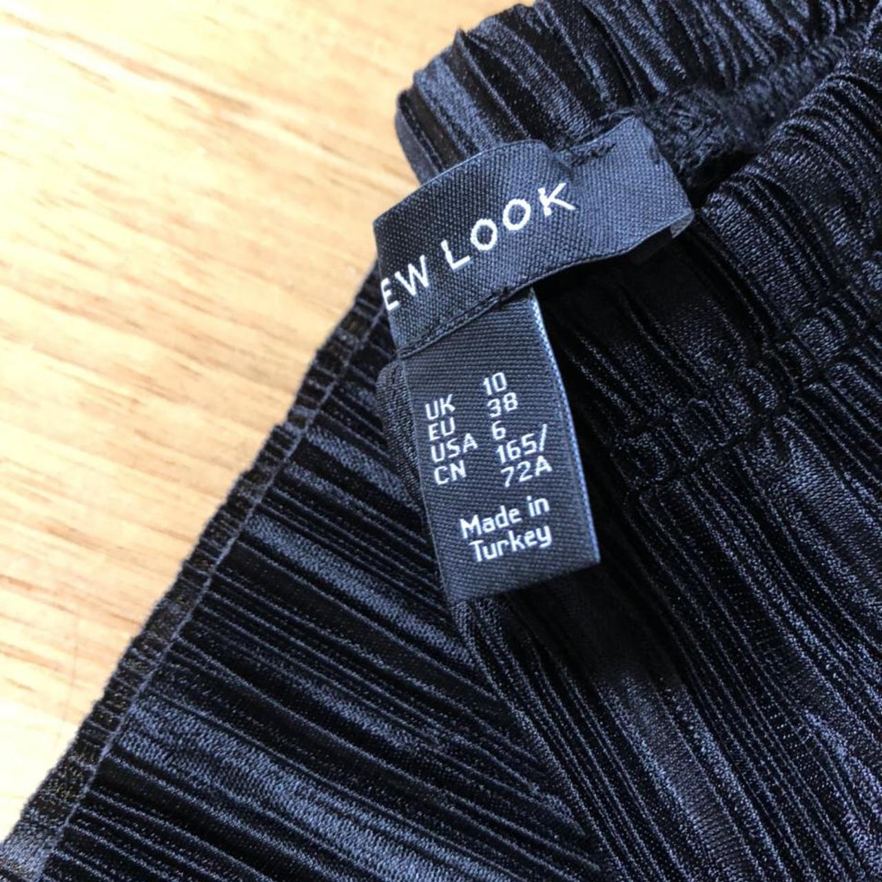 Black pleated New Look pants. - Depop