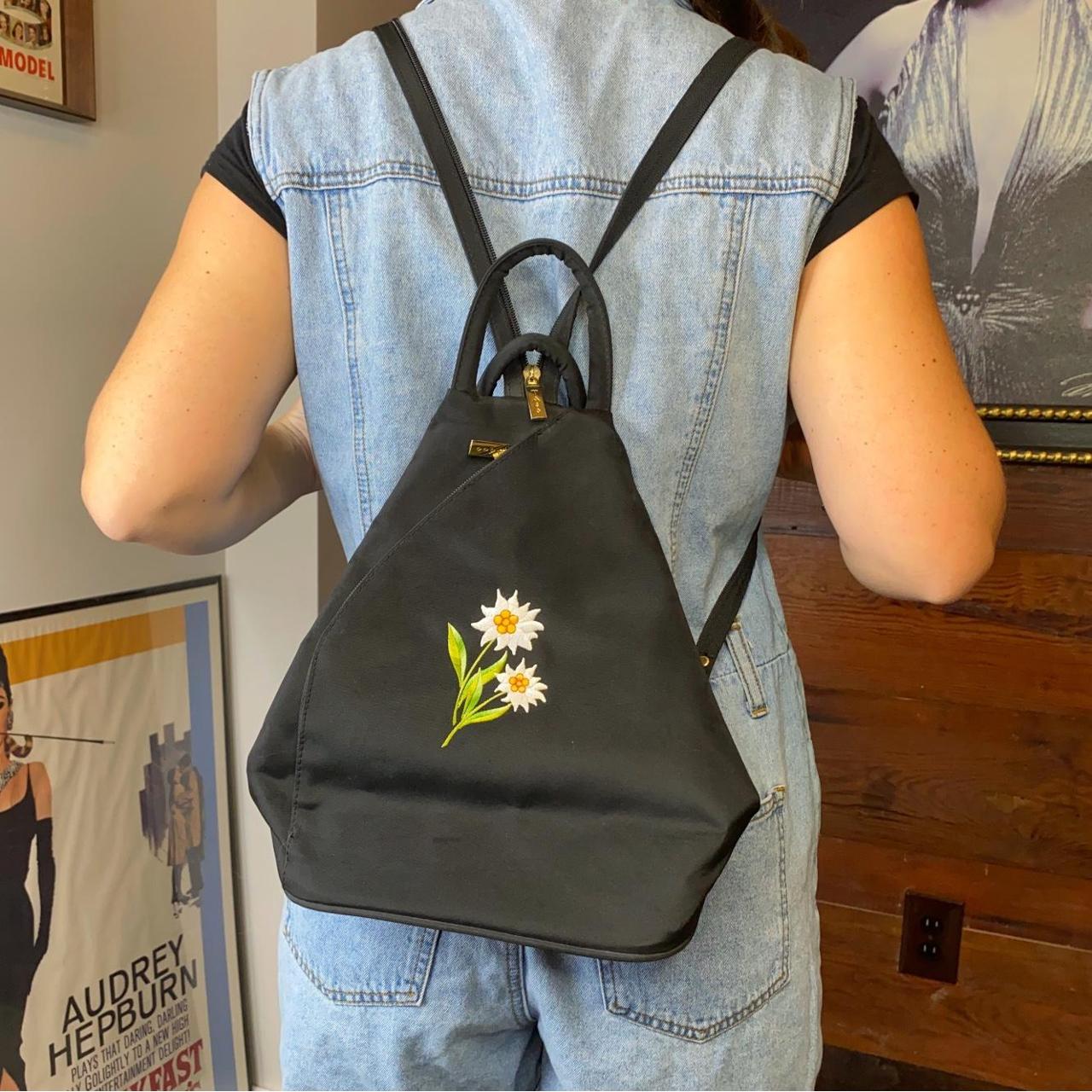 Black mini backpack with embroidered flower In new... - Depop