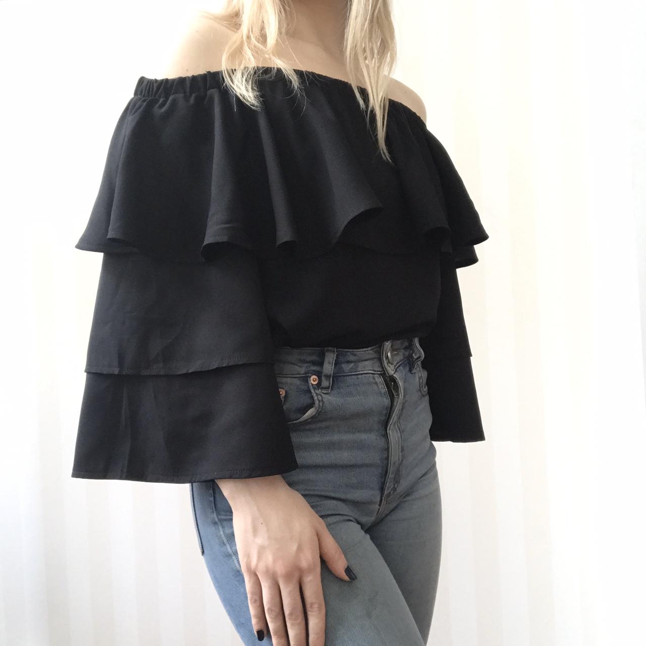 Black off-shoulder ruffle top, statement piece.... - Depop