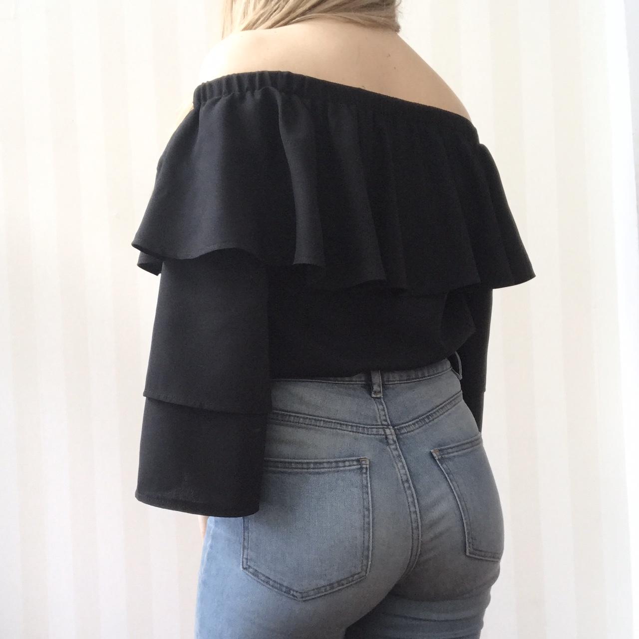 Black off-shoulder ruffle top, statement piece.... - Depop