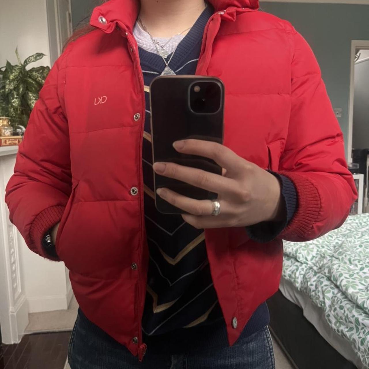 Calvin Klein red puffer jacket/gilet sleeves can be... - Depop