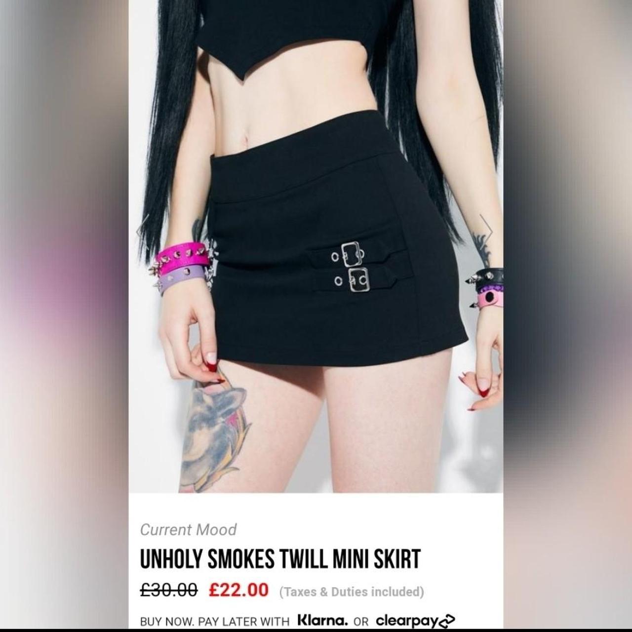 black mini skirt with buckles from kill star, sold... - Depop