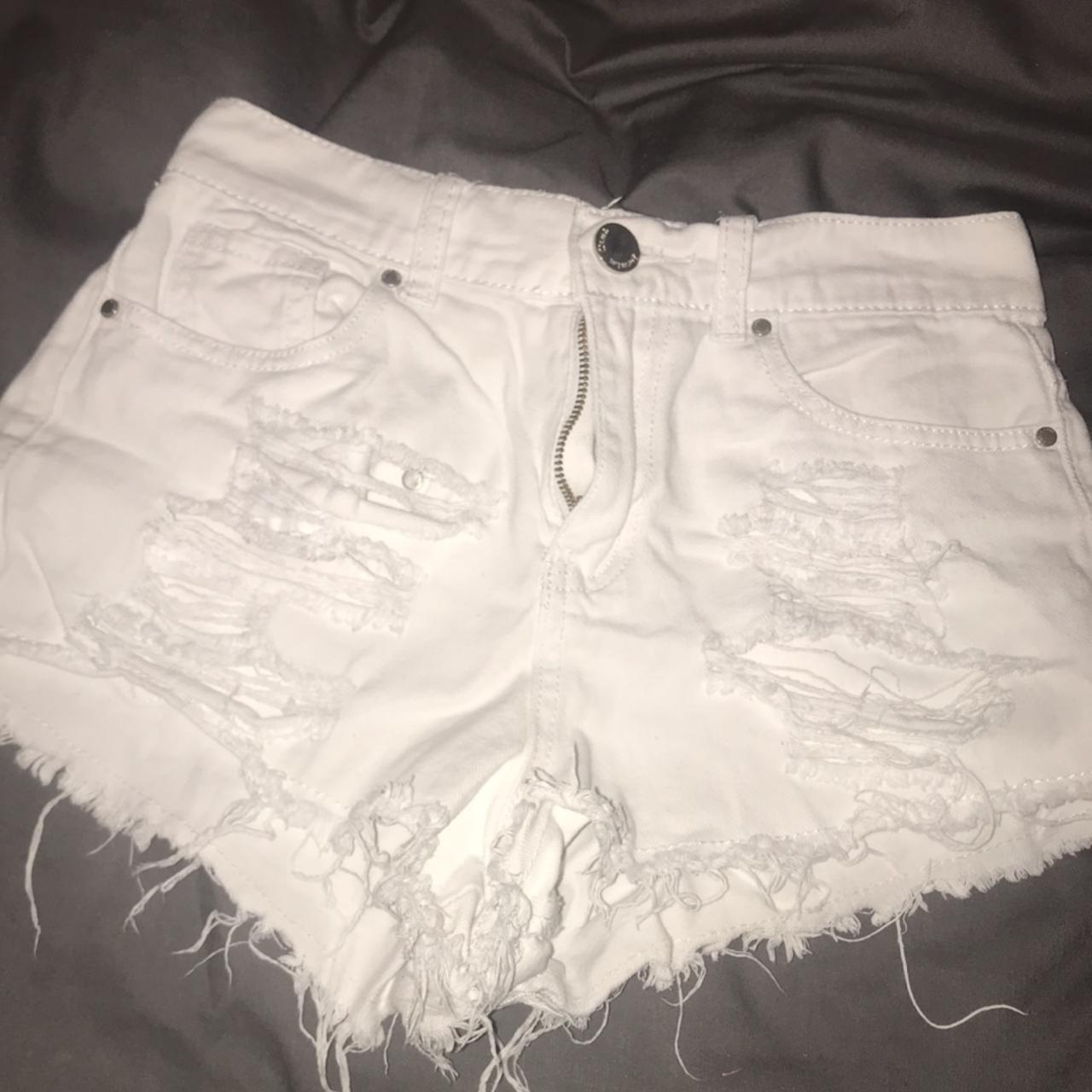 Over ripped white denim shorts worn once good... - Depop