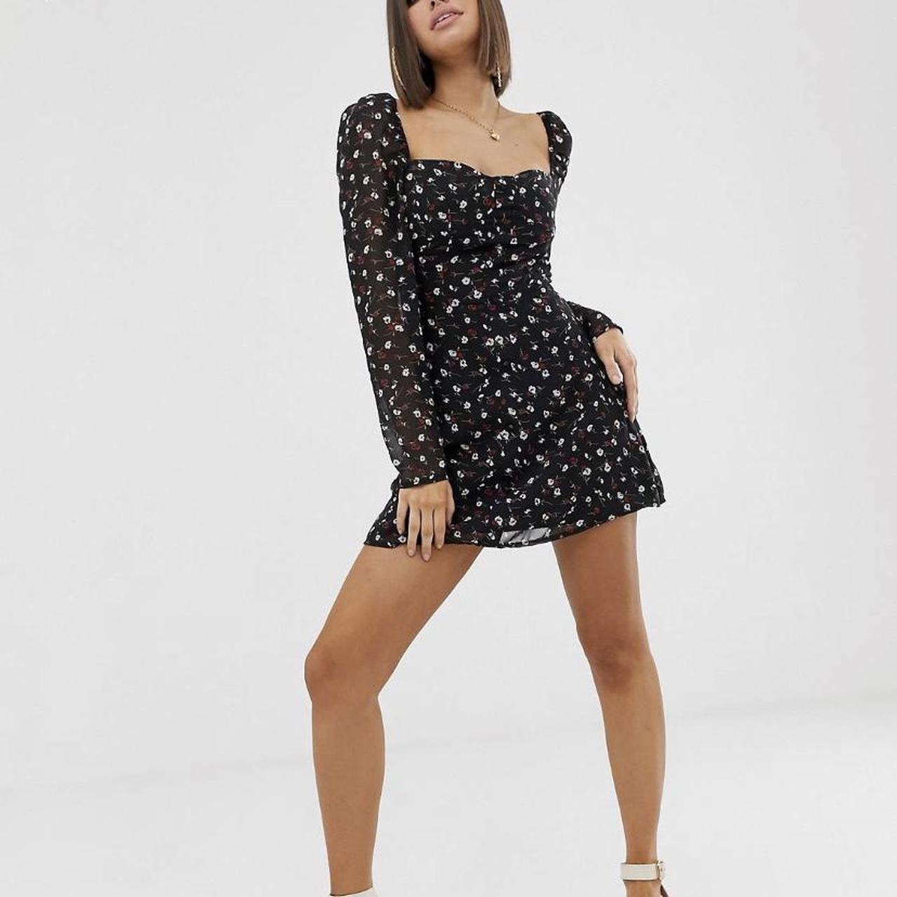 Missguided cute mini dress in a floral print, worn... - Depop