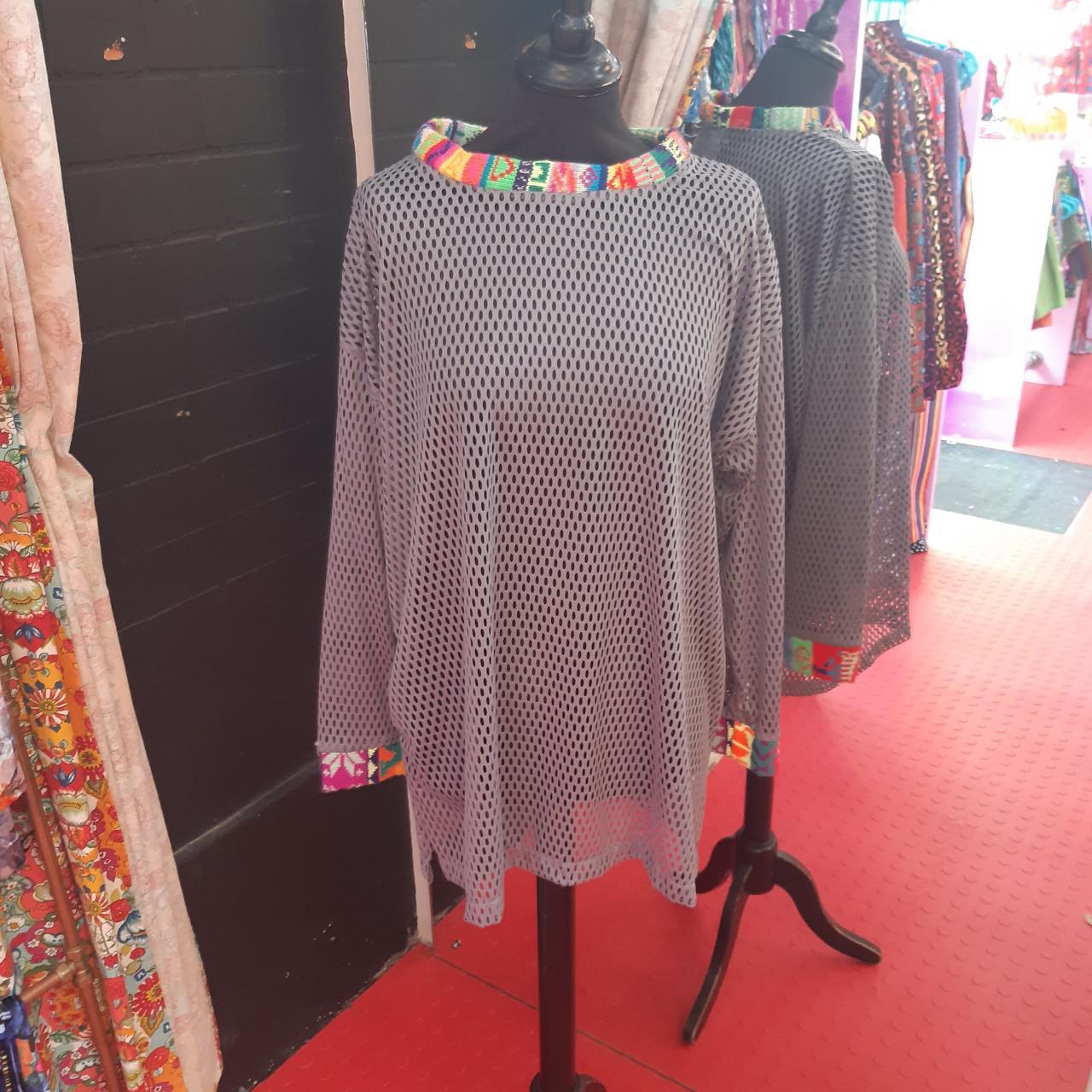 Jumper in grey sports mesh. Feature side vents,... - Depop