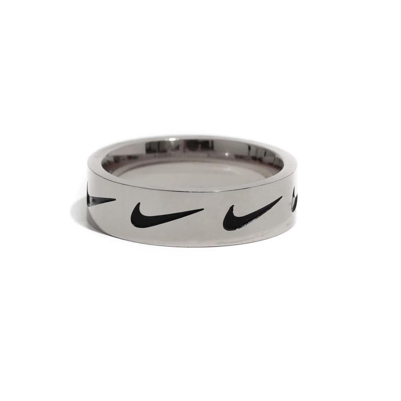 Custom Nike ring 🤚🏻 | Silver available in size 8 and... - Depop