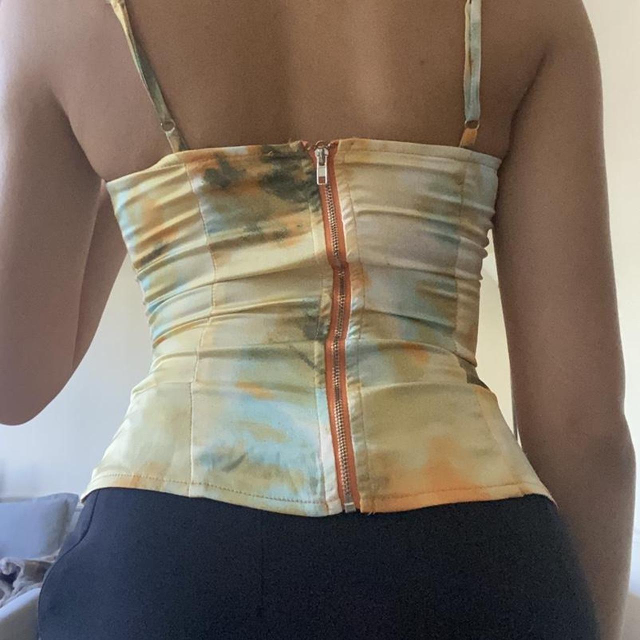 Wire corset top with abstract orange and green... - Depop