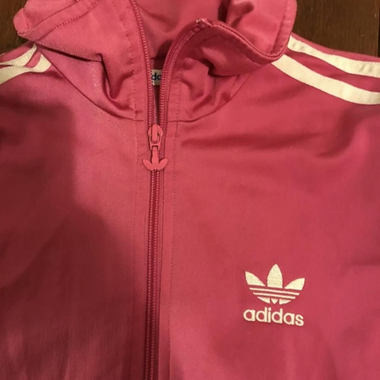 Bright pink Adidas zip up tracksuit style jacket. It... - Depop