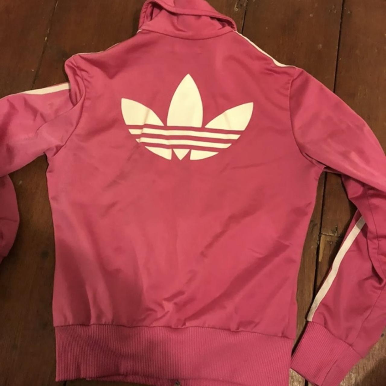 Bright pink Adidas zip up tracksuit style jacket. It... - Depop