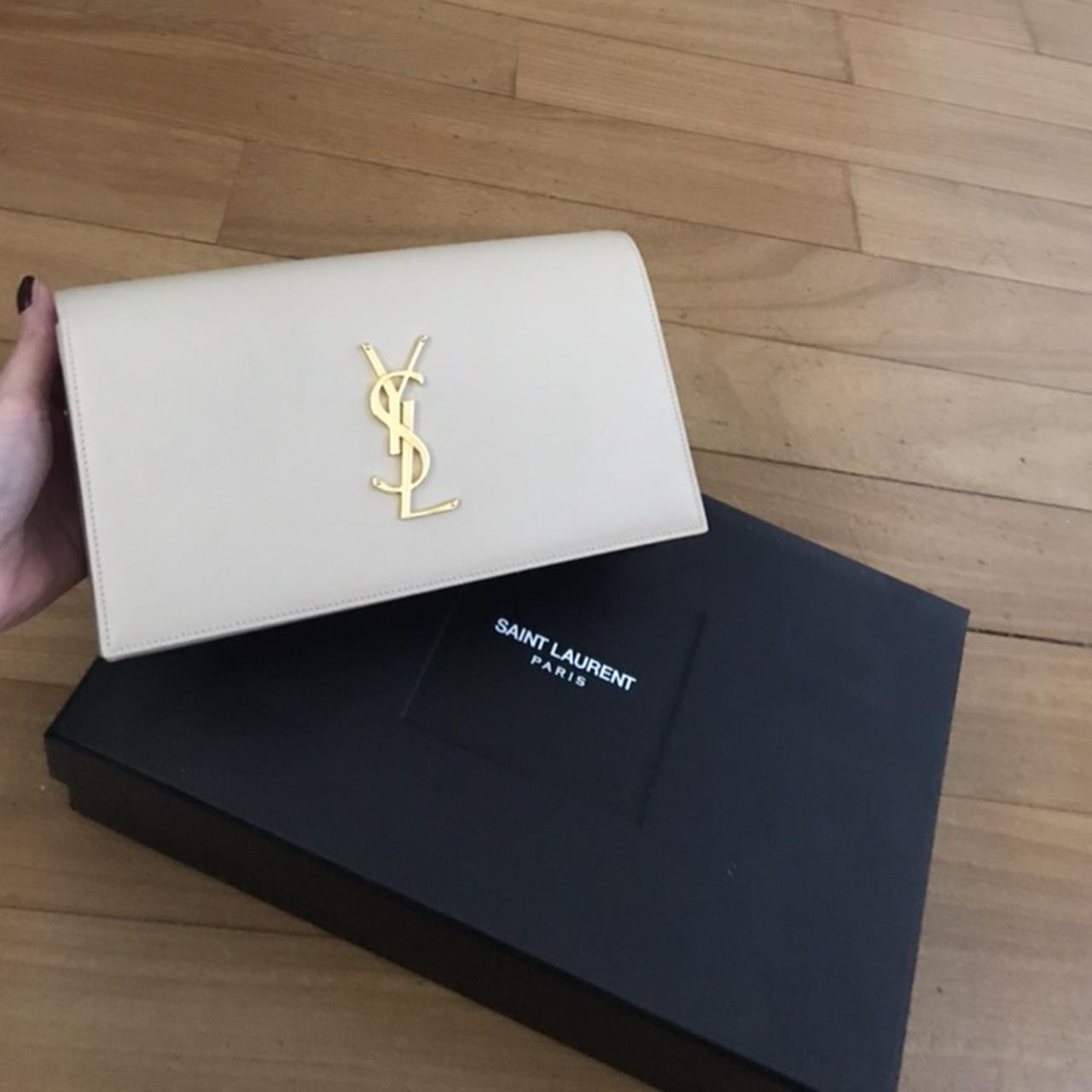 Clutch saint laurent color cipria con logo oro... - Depop
