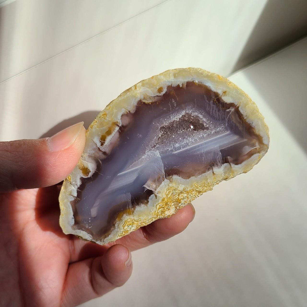 Geode half with polished face and druzy center... - Depop