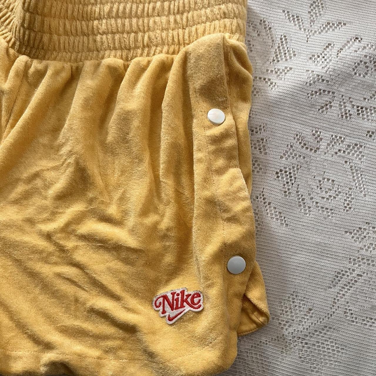 NIKE pastel yellow towelling popper shorts 🤫 super... - Depop