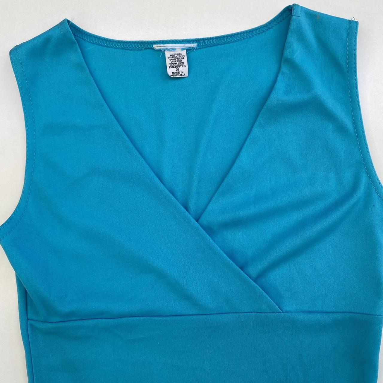 Aqua blue Y2K tank top Love the crossover detail... - Depop