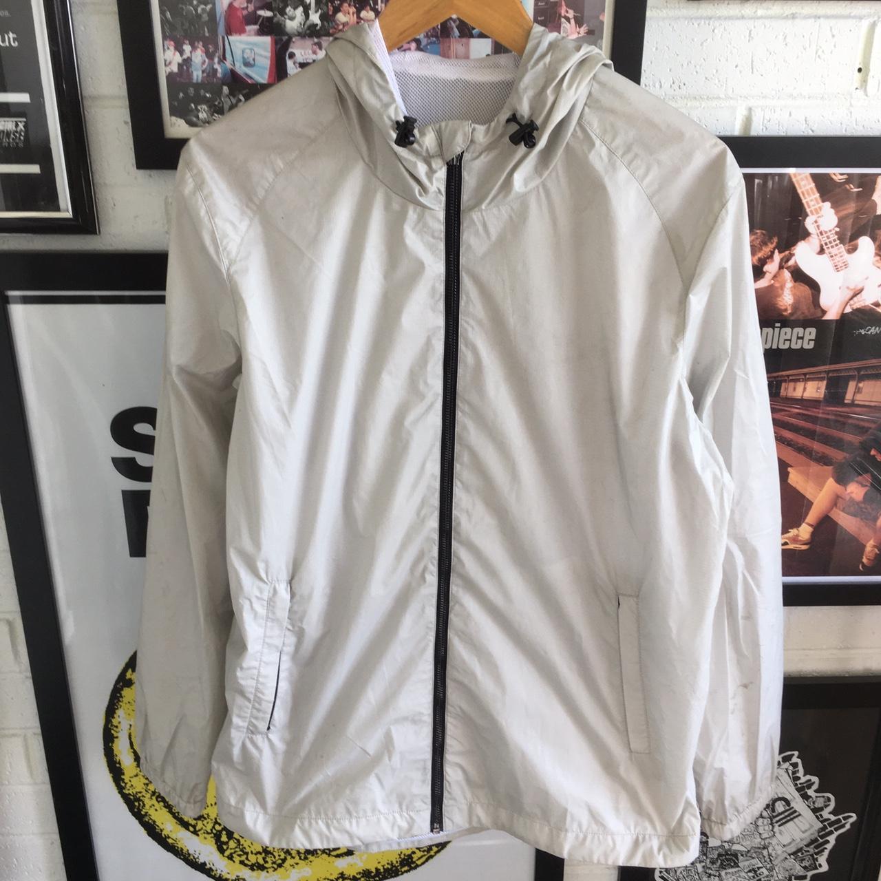 Blank zip up windbreaker. Fits around a size large.... - Depop