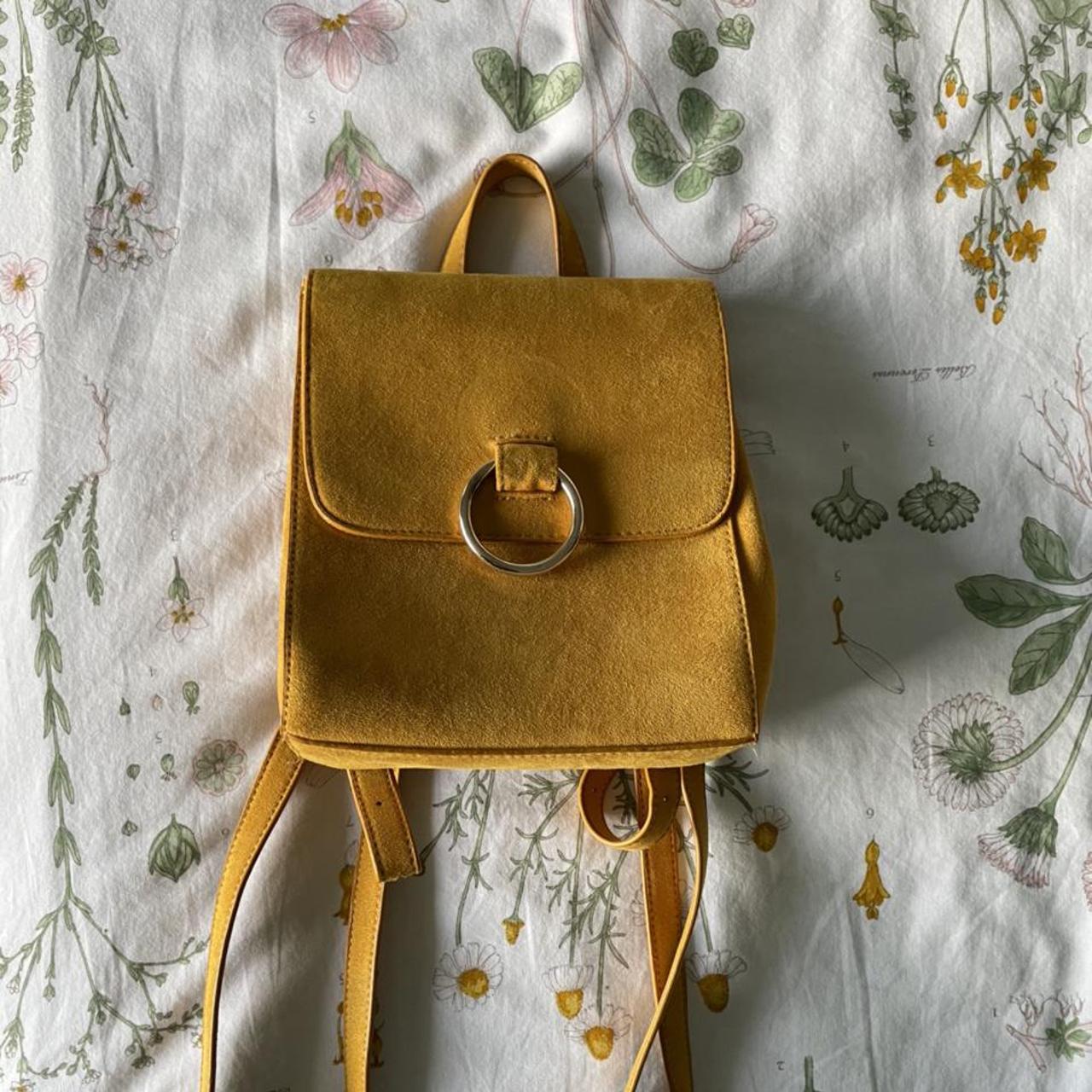Mini mustard backpack!! Taken care of and in perfect... - Depop