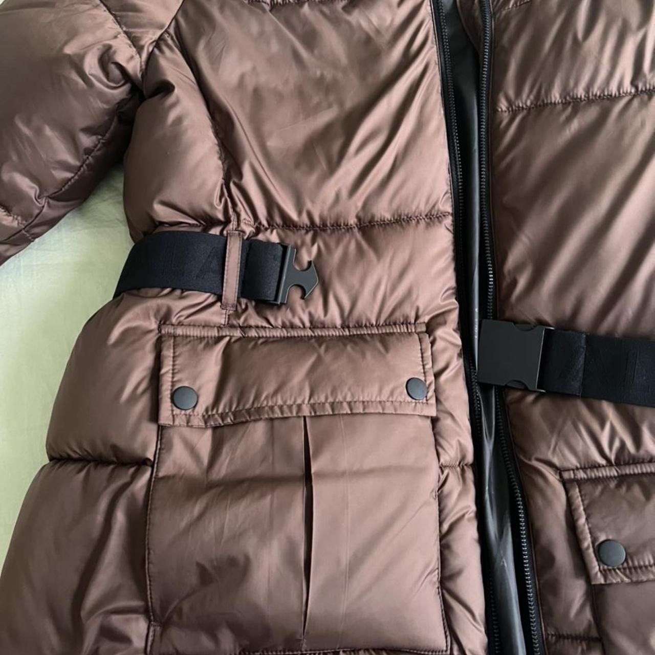 We are tala zero belted brown puffer. Out of stock!!... - Depop