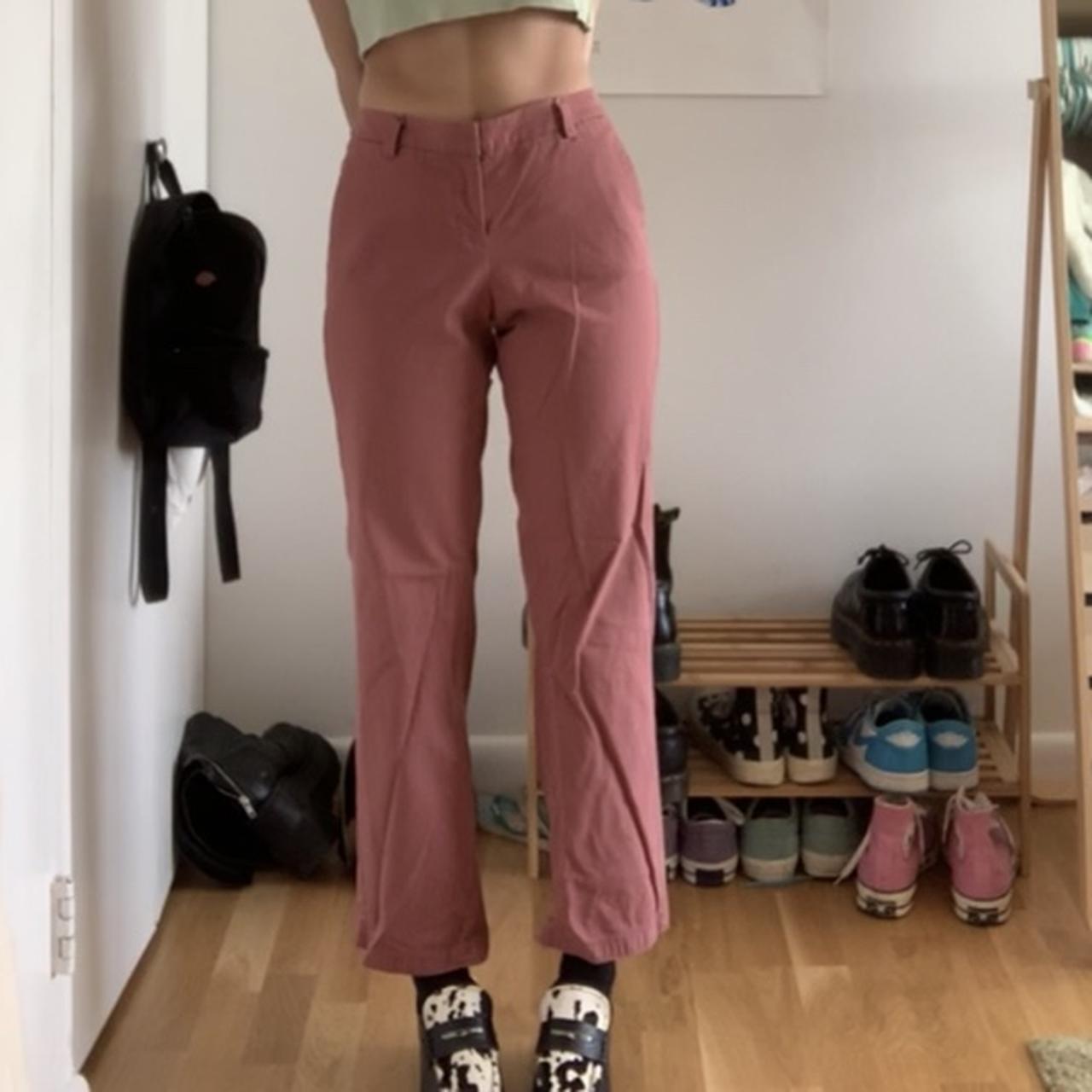 Pink flares with adjustable waist. Fits a size small... - Depop