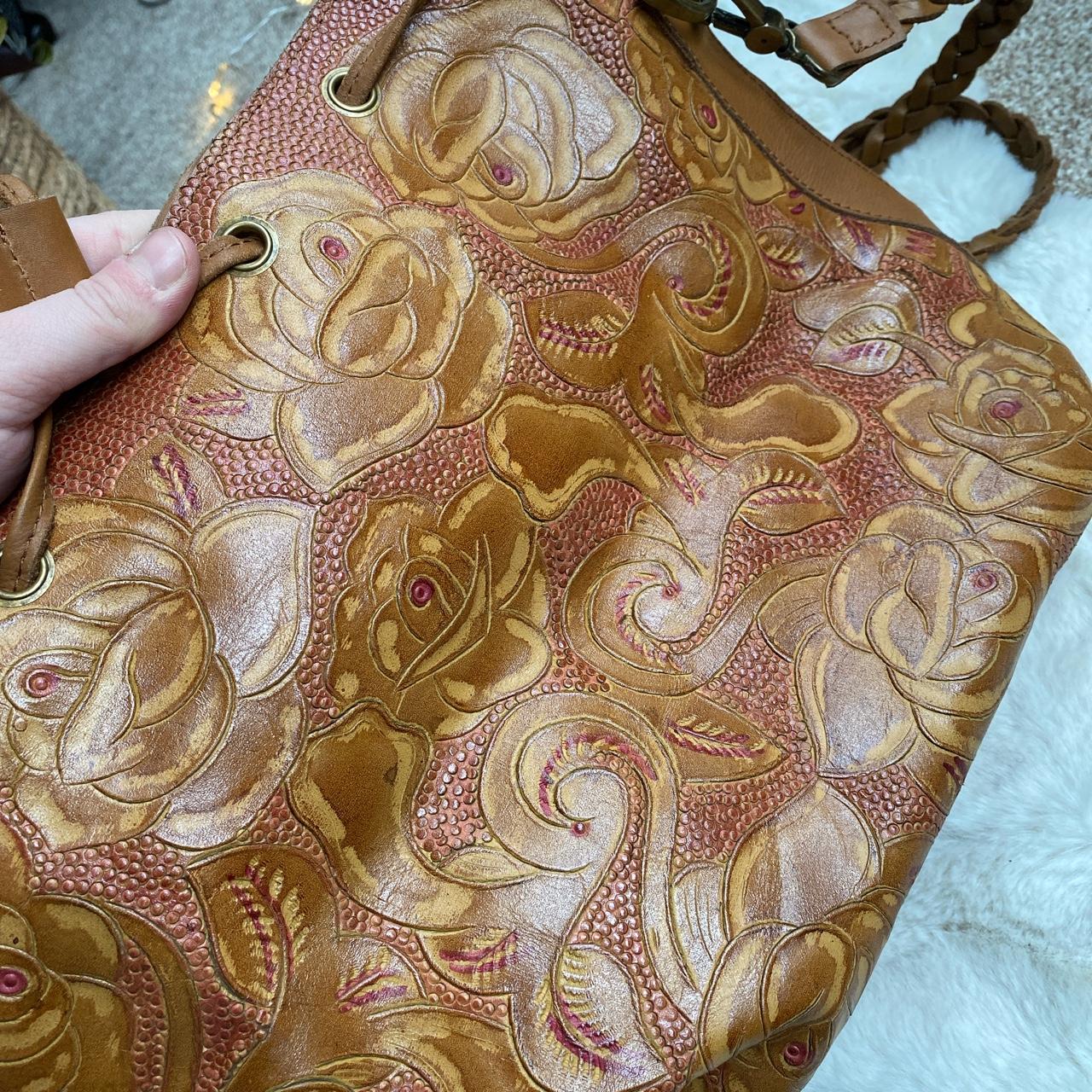Absolutely beautiful tan leather floral embossed... - Depop