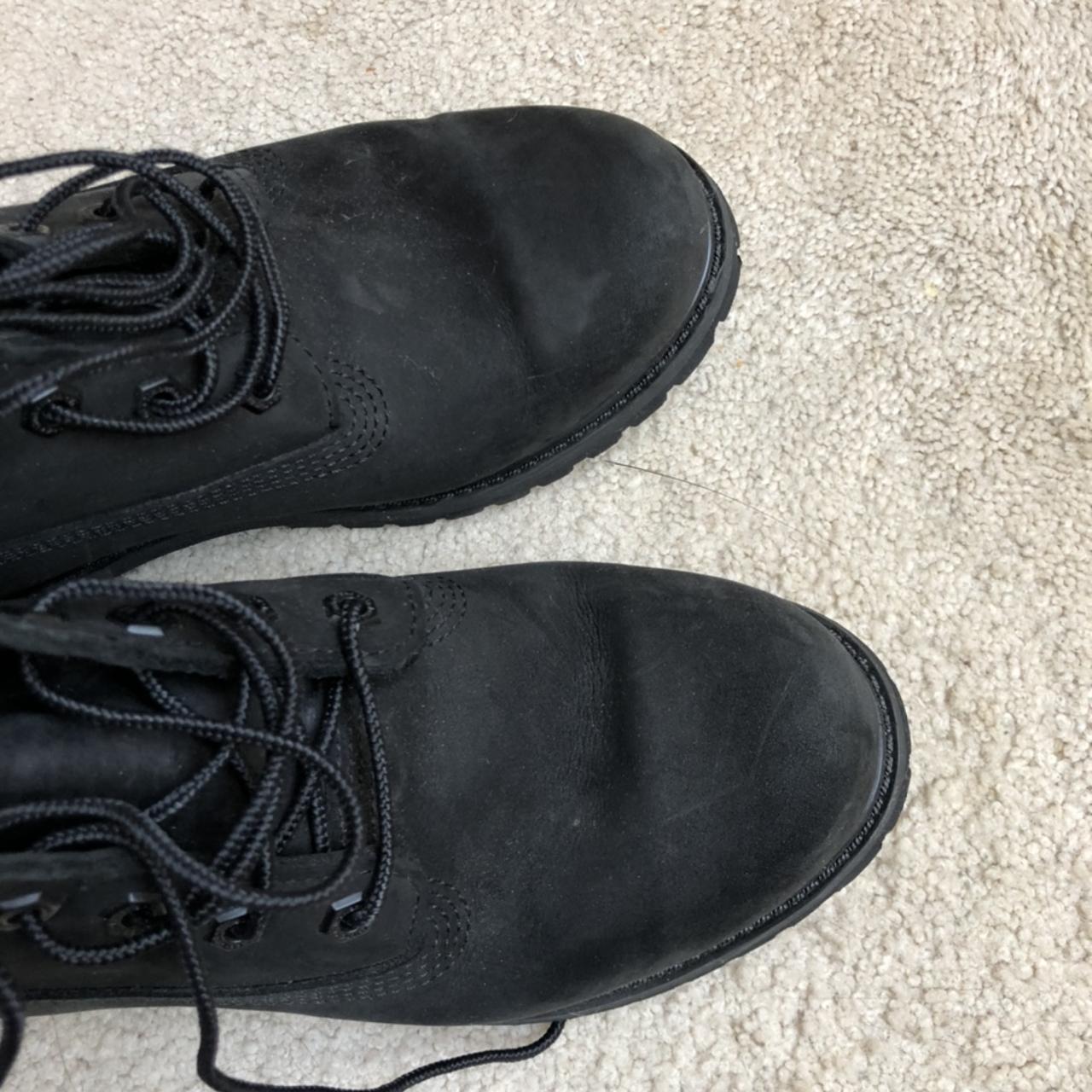 all black timberland boots minor creasing on the... - Depop