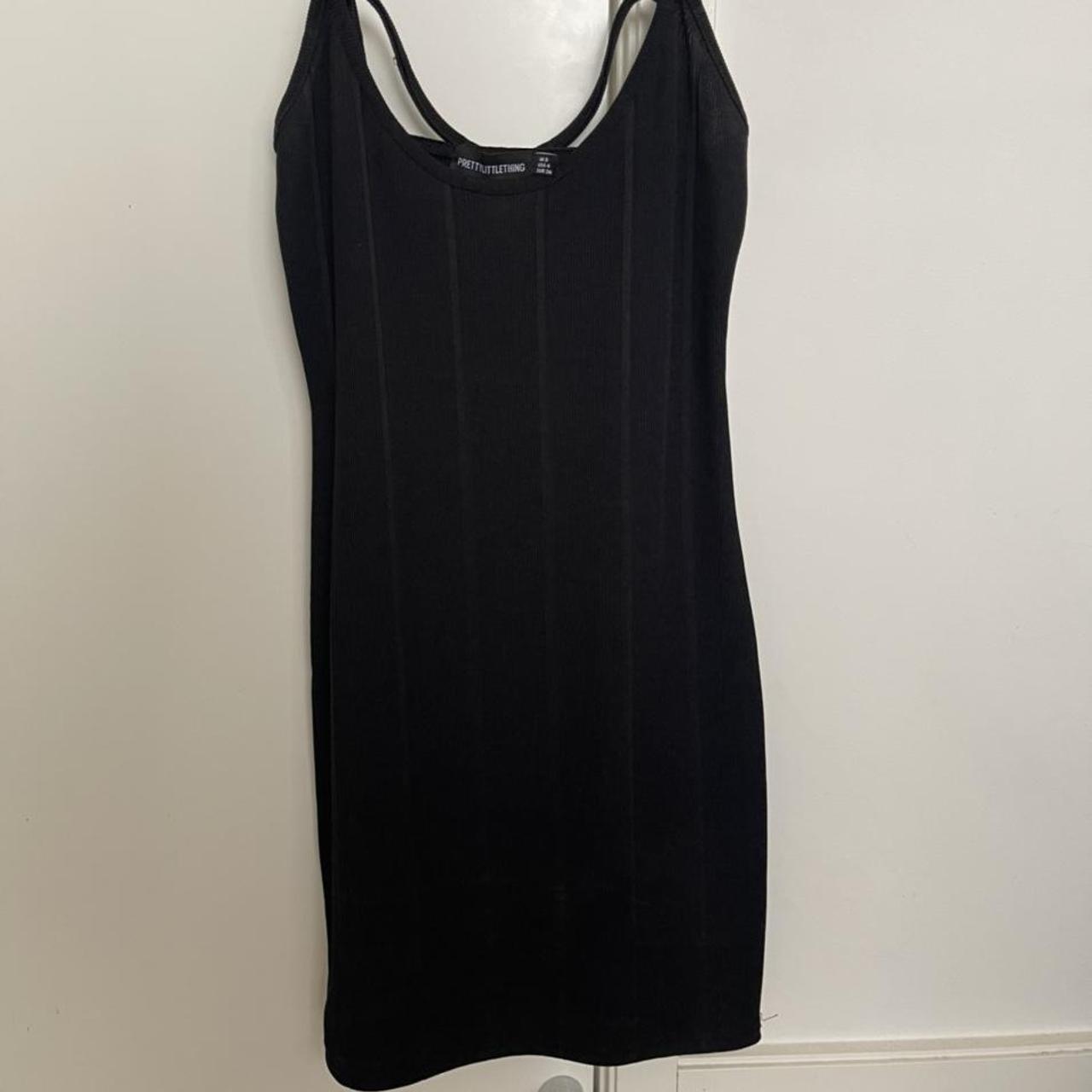 Black ribbed bodycon dress with double straps -... - Depop