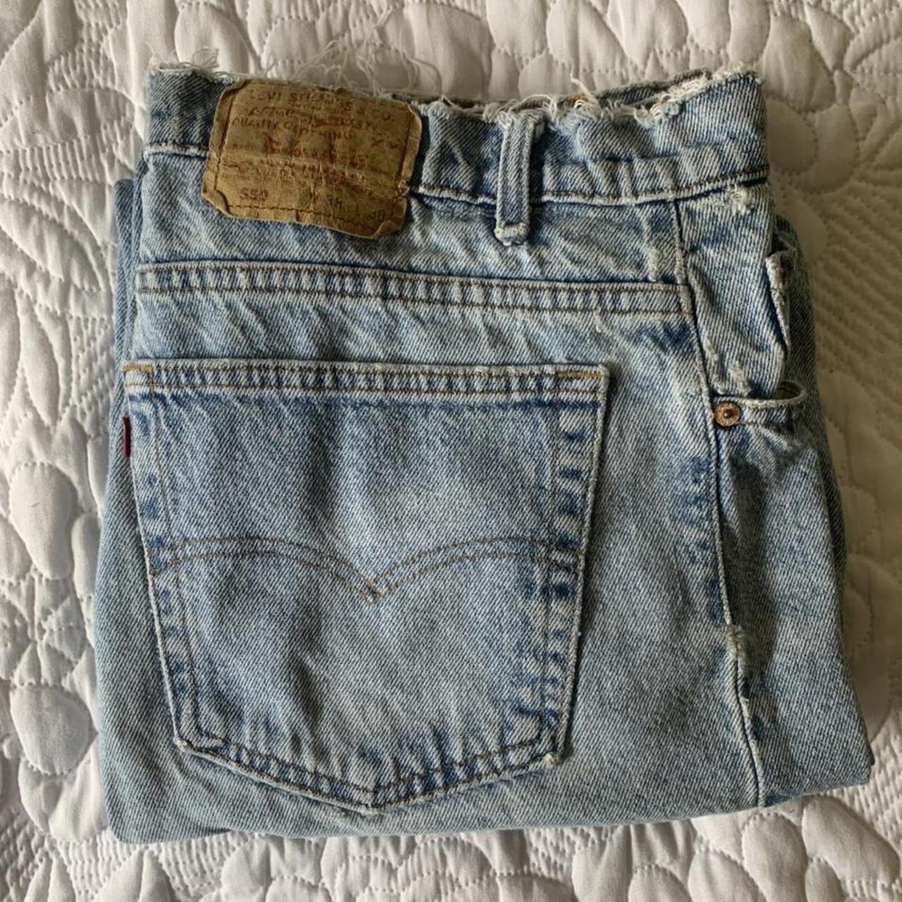 Vintage Levi’s 550 distressed hem high waisted... - Depop